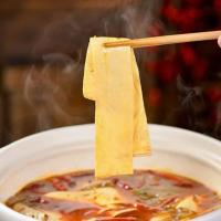 China Plant Based Bean Curd Skin Vacuum Packaging Soft Texture Spicy Flavor Tofu Skin Roll for sale