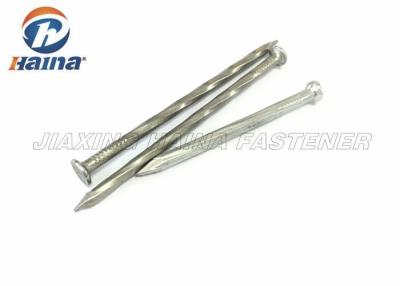 China Hardened #45 Steel Concrete Nails Checkered Head Spiral Shank For Cement Walls for sale