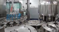 China High Accuracy Stainless Steel Electric 2500 BPH Filling Machine for sale