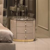China Italian Minimalist Modern Bedside Tables Titanium 3 Drawer Modern Nightstand for sale