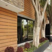 China Co-Extrusion WPC Wall Cladding Panel 20mm x 155mm Outdoor Decorative Siding for Villa for sale