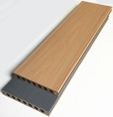 China Coextrusion WPC Decking 140x23mm Anti-slip Waterproof UV Resistant Teak Color Outdoor Flooring for sale