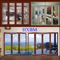 China Water Resistant Aluminium Doors With Wooden Finish With Wide Openings for sale