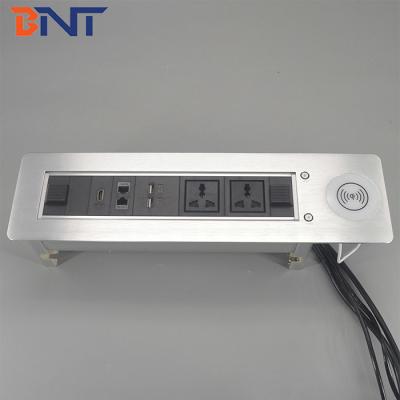 China Qi Wireless Charger Motorized Flip Up Power Outlet for sale