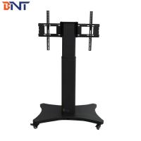 China Electric Lifting Floor Standing Moving Tv Bracket Movable Wheels for sale