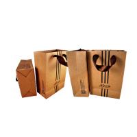 China Flat Handle Kraft Paper Bag Printing 4C+0 Cover color Gold hot foil stamping for sale