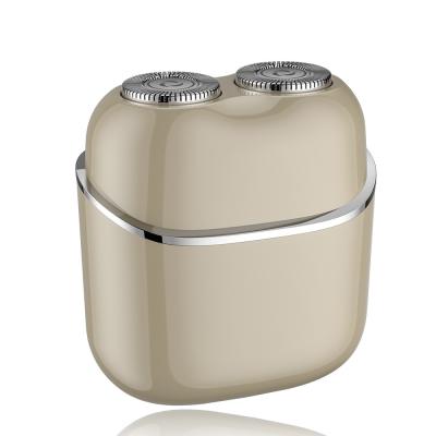China Portable Mini Dual-Head Electric Shaver Fully Washable with Magnetic Floating Design for Men for sale