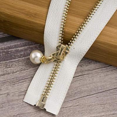 China Metal Open Tail Zipper Pearl Slider Jacket Double Head Metal Zipper for sale