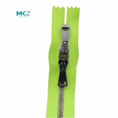 China Fluorescent Green Point Teeth Two Way Open Ended Zippers Copper for sale