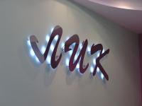 China 3D Custom Seiko Backlit LED Word Stainless Steel Channel Letter Sign for Retail Shop for sale