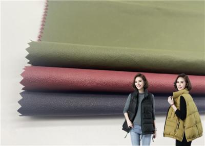 China 100% Nylon Embossing Lightweight Winter Jacket Fabric Water Repellent for sale