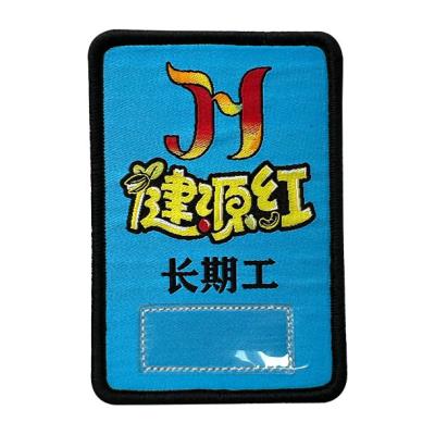 China Custom Fabric Embroidered Patch Badges Iron On Woven Patch 100 Pcs MOQ for sale