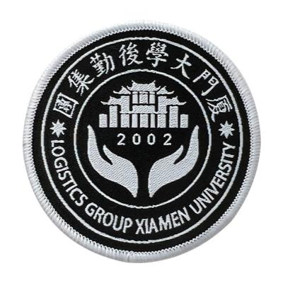 China Custom Iron On Woven Patch Merrowed Border 100 Pcs Min Order University Clothing Embroidery for sale