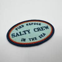 China Custom 4 Color Embroidered Letter Patch Merrow Border Iron On Backing 5cm for sale