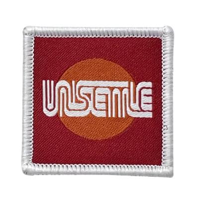 China Custom Brand Name Woven Logo Patch Stitched Name Patches With Merrow Border for sale