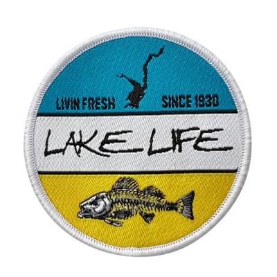 China Custom Woven Patch OEM Iron On Embroidered Badge for Clothing 2mm Letter Size for sale