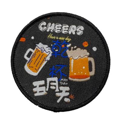 China Designer Cheers Iron On Embroidery Patches Polyester Thread Woven Logo Patch for sale