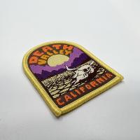 China Custom 12 cm Iron On Woven Patches Merrowed Border for Clothing Custom Logo for sale