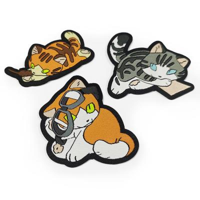China Custom Iron On Woven Patch Merrow Border Laser Cut 3D Embroidered Patch for Clothing for sale