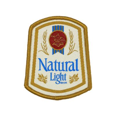China Merrow Edge Woven Logo Patch / School Logo Iron On Patches for sale