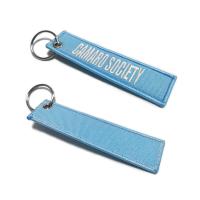 China Merrow Border Embroidered Key Chains Fabric Material OEM With Metal Ring Eyelet for sale