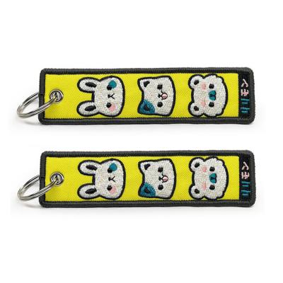 China Custom Embroidered Keychain 10x2.5cm Merrowed Border Personalized Key Tag OEM for sale