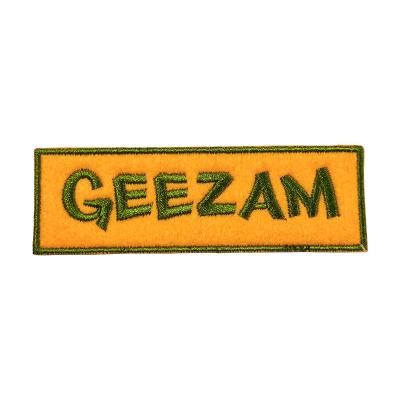 China Custom Embroidered Fabric Patches Washable Twill Felt Merrow Border 100pcs MOQ for sale