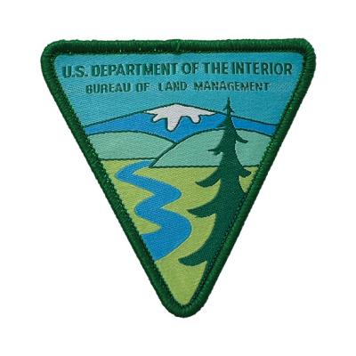 China Wholesale Triangle Self Adhesive Iron On Woven Patches 100 Pcs Custom Shape for Garments Bags Hats for sale