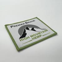 China Custom Personalized Hot Melt Iron On Woven Patch Merrow Border For Wristband for sale