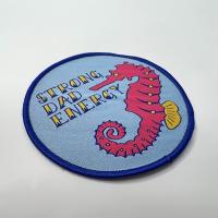 China Round Twill Woven Clothing Patch 12C Pantone Colors Iron On Patches 100 PCS for sale