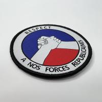 China Cloth Round Embroidery Patches Iron On Backing Adhesive Woven Patch for sale