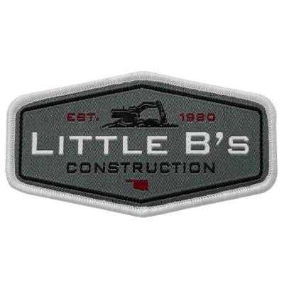 China Custom Woven Patch Embroidered Badge Iron On Merrow Border 100 PCS MOQ Polyester Yarn for sale