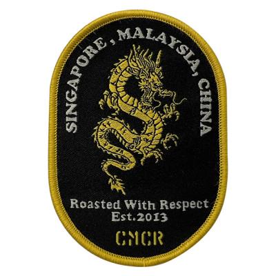 China Customized Melt Adhesive Dragon Embroidery Patches Shrink Proof Merrow Border for sale