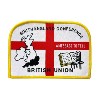 China OEM Custom Carton Map Iron On Woven Patches Handmade Border Custom Shape For Clothing for sale