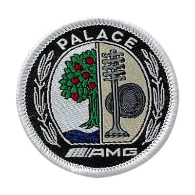 China Custom Iron On Woven Patch Overlock Interlining for Garment Bag 100pcs MOQ for sale