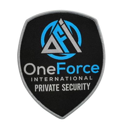 China Custom Iron On Woven Patches Merrow Border Velcro Backing 100 PCS Washable Durable for sale