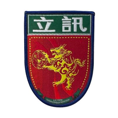 China Custom Chinese Element Yarn Woven Patches Hot Melt With Merrow Border for sale