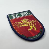 China Custom Chinese Element Yarn Woven Patches Hot Melt With Merrow Border for sale