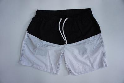 China Quick Dry Nylon Men Board Shorts Elastic Waistband 2 Pockets Silkscreen Printing for sale