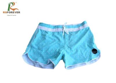 China Custom Sublimated Light Blue Swim Trunks for Women Water Repellent 4 Way Stretch for sale