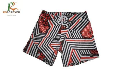 China Custom 4 Way Stretch Boys Surf Shorts Kids Beach Swim Trunks 100% Polyester for sale