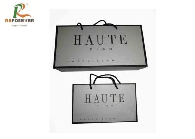China Custom Printed Luxury Paper Shopping Bags with Rope Handle for Clothing Packaging for sale