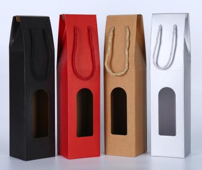 China UV Coating 2 Ply Wine Bottle Paper Bags With Cut Out Windows wine bottle drawstring fabric bag packaging for sale