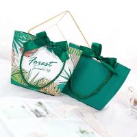 China Tropical Plant Print Lime Green Paper Bags With Ribbon Handles for sale