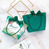 China Tropical Plant Print Lime Green Paper Bags With Ribbon Handles for sale