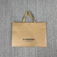 China 200pcs To 500pcs Gold Stamping Clothing Paper Bags Ribbon Handles Kraft Shopping Bags for sale