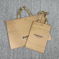 China 200pcs To 500pcs Gold Stamping Clothing Paper Bags Ribbon Handles Kraft Shopping Bags for sale