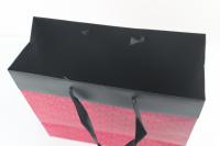 China OEM Debossing Clothing Paper Bags for sale