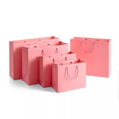 China ISO Offset Printing Clothing Paper Bags Underwear Cinnamon Pink Paper Bag for sale