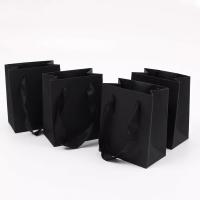 China Waterproof Oilproof Clothing Paper Bags Supermarket Black Paper Shopping Bags for sale